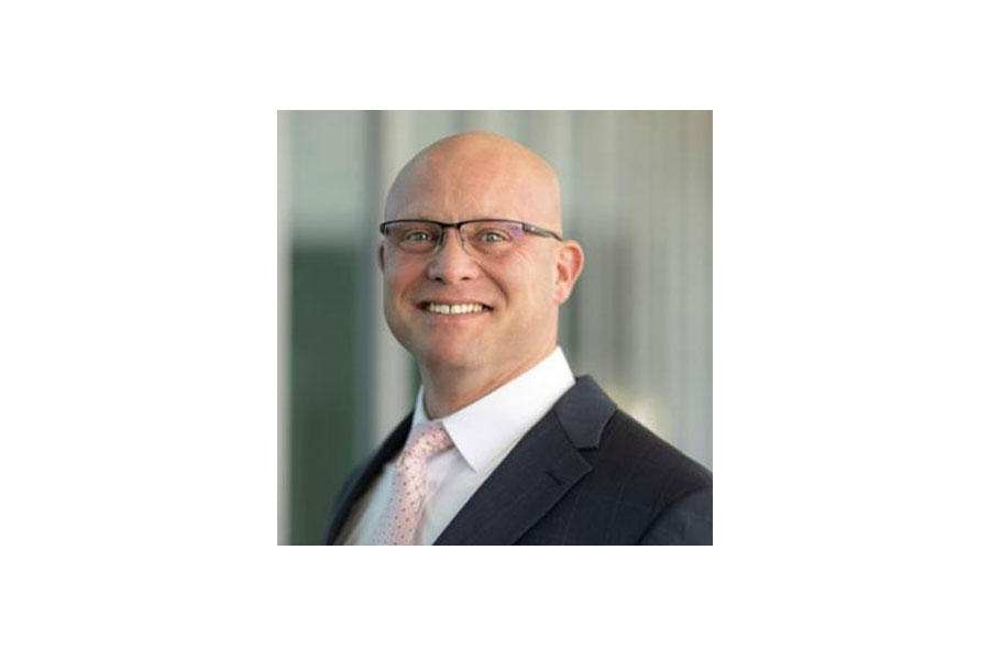 Coaching softball proves to be Adrian Peele’s love language - Synovus